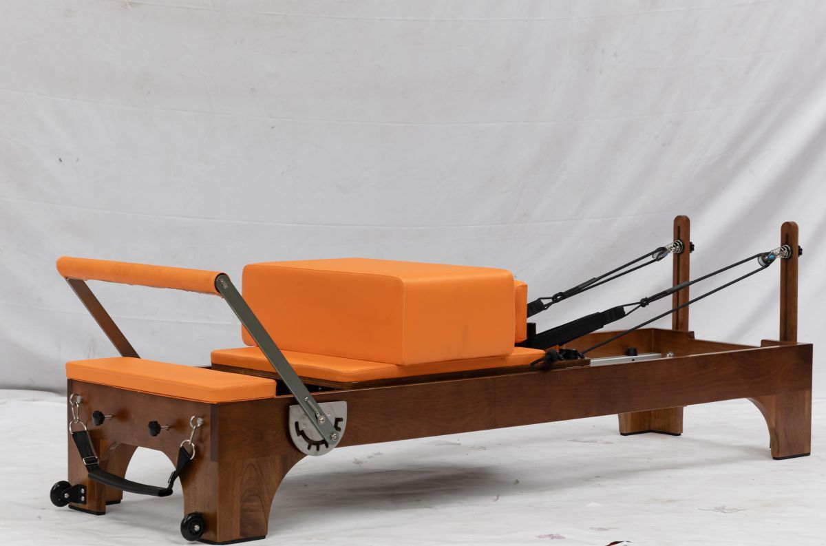 Pilates Reformer made of high-quality Walnut Wood from naisen