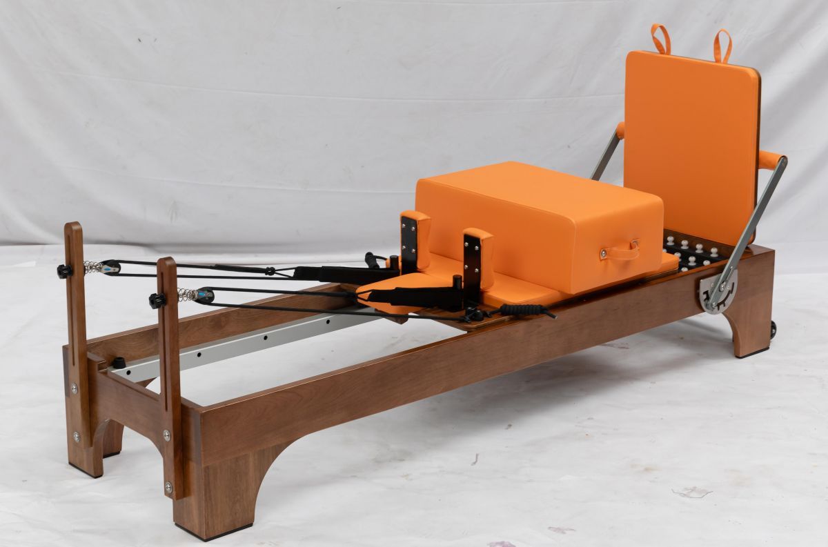 Pilates Reformer made of high-quality Walnut Wood from naisen